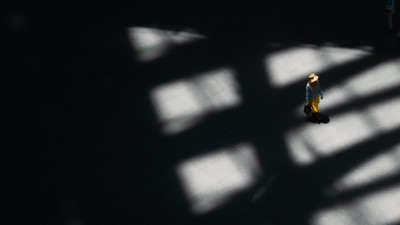 A lady emerging from the shadows by Seiji Takahashi