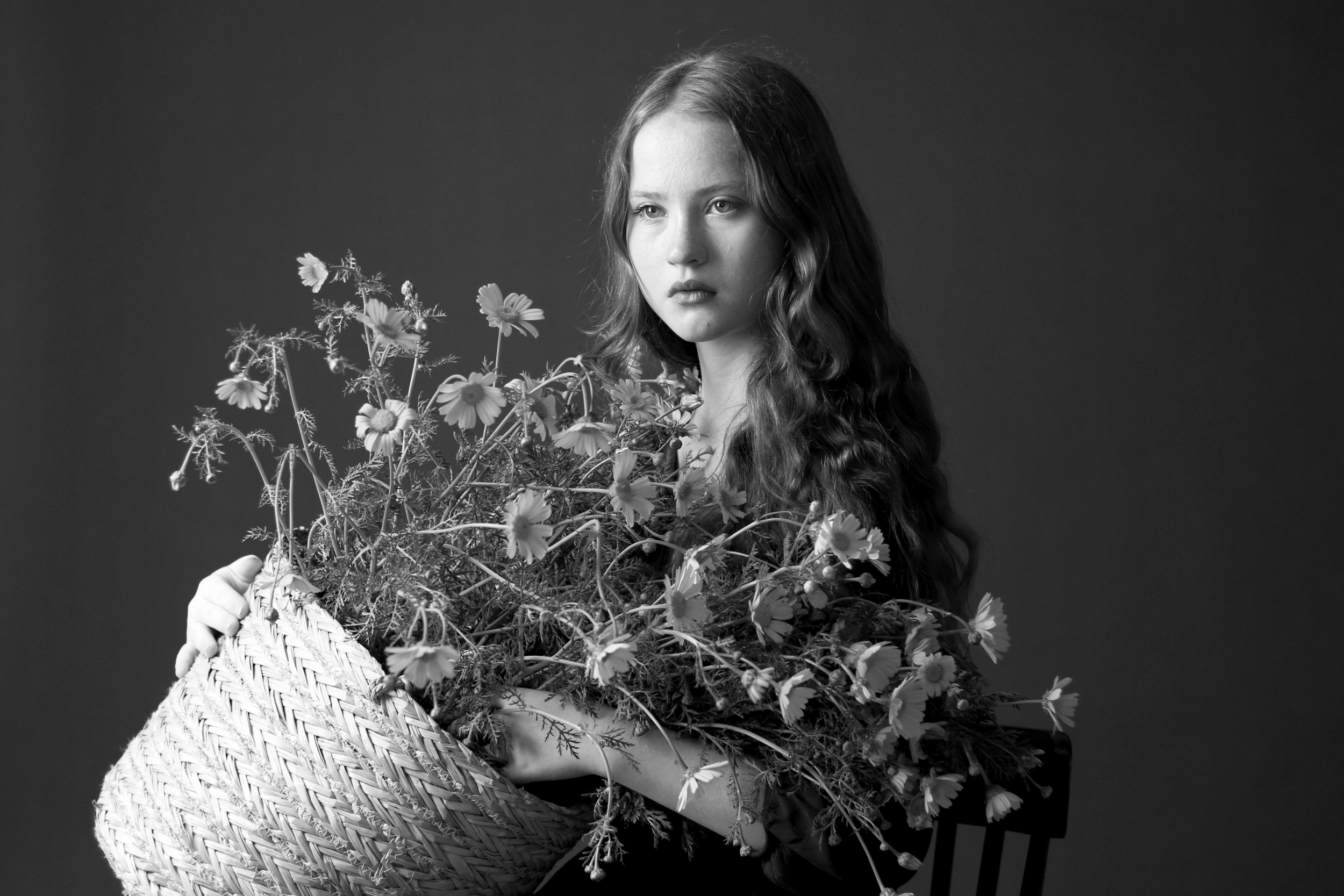 A girl with flowers by Anna Kogan