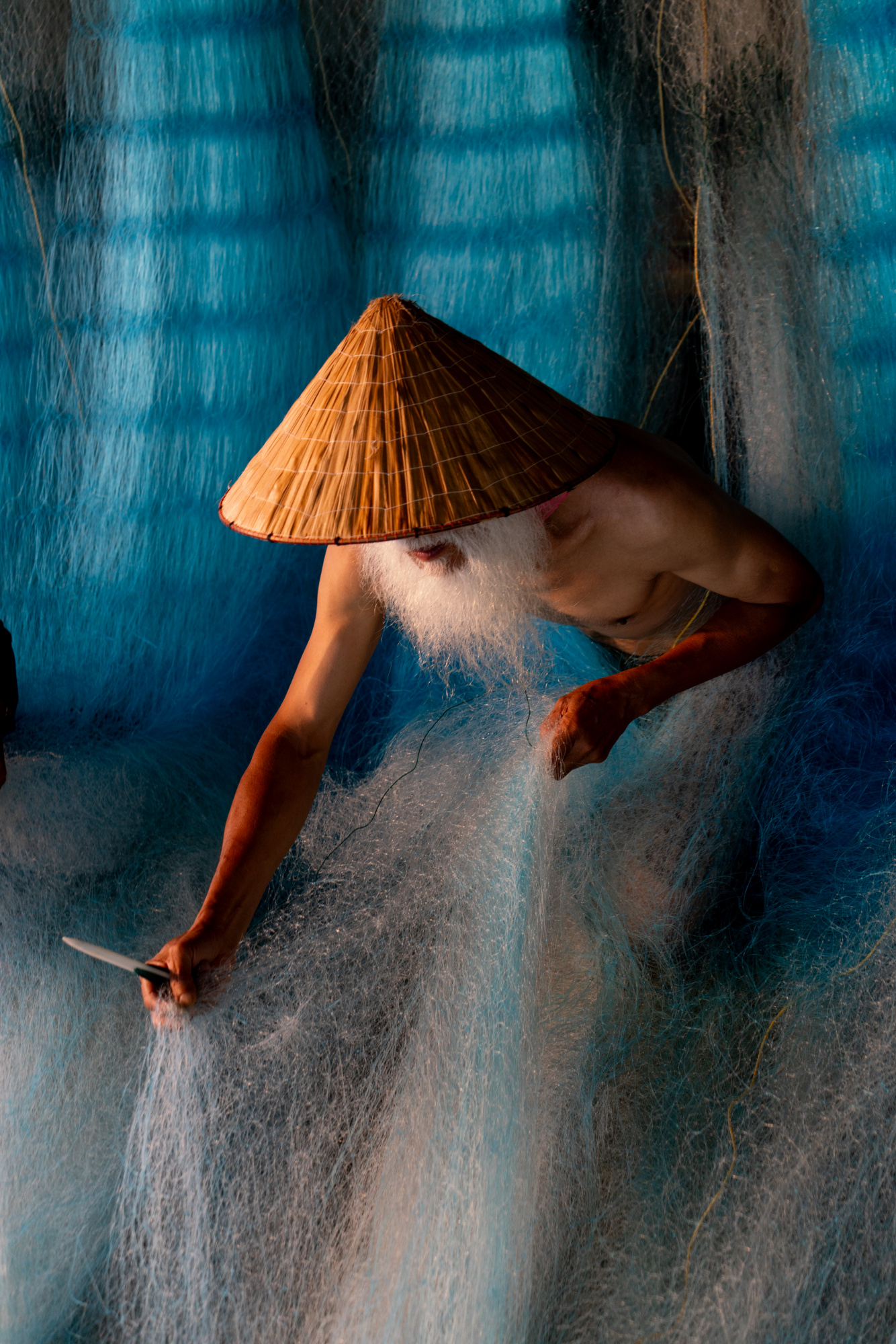 Net Weaver of the Sea by Tran Van Truong