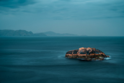 Lonely Rock by Calvin Feng