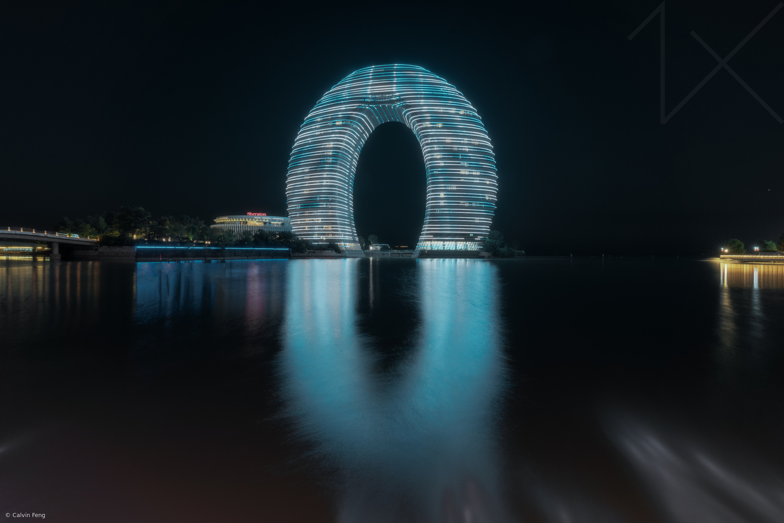 Lake & building by Calvin Feng