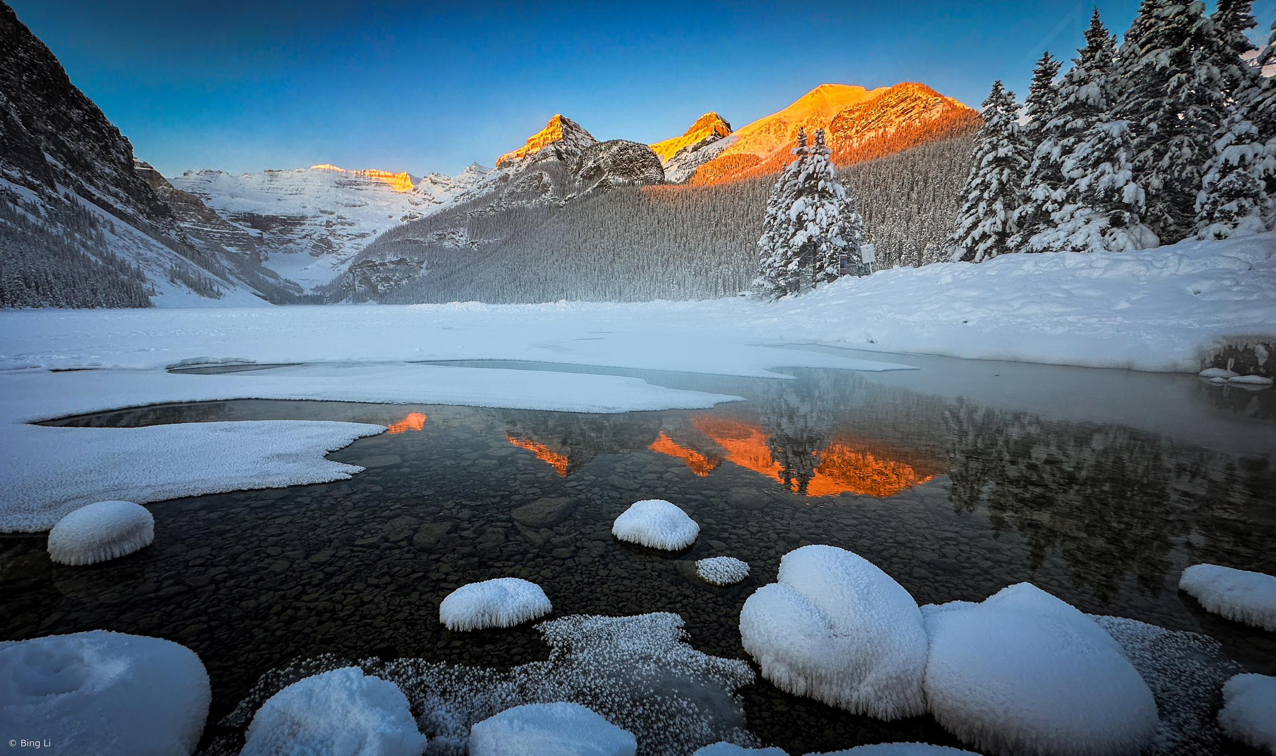 A cold but beautiful morning at Lake Louise by Bing Li
